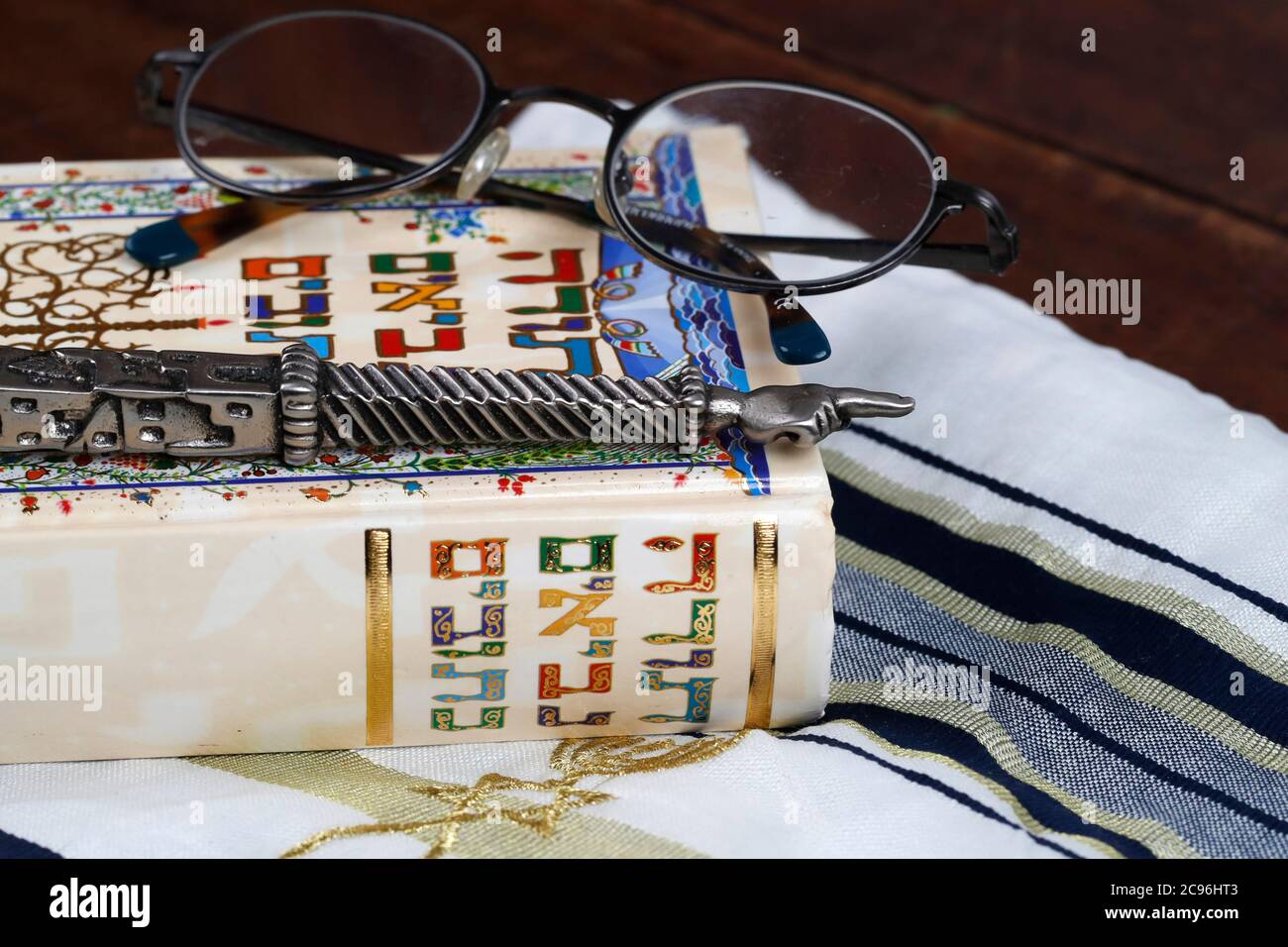 Torah, yad, tallit and pair of glasses. Jewish symbols. France Stock ...