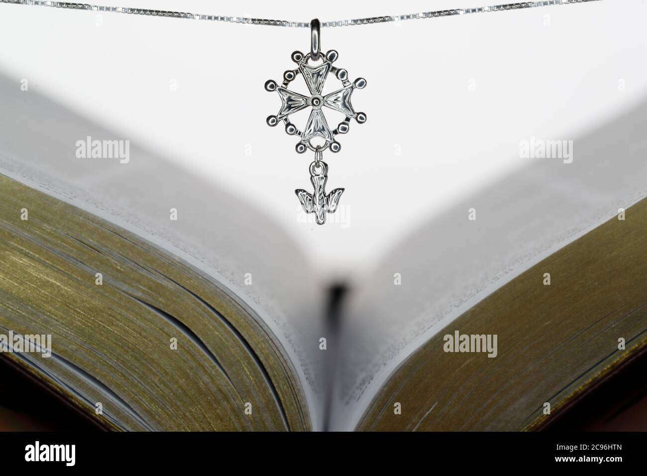 Open Bible and the Huguenot cross, a popular symbol of the evangelical ...