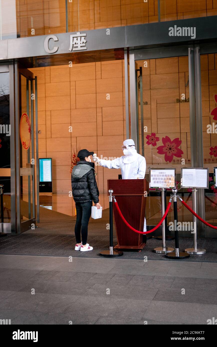 The body temperature check post on the entrance to business centre ...