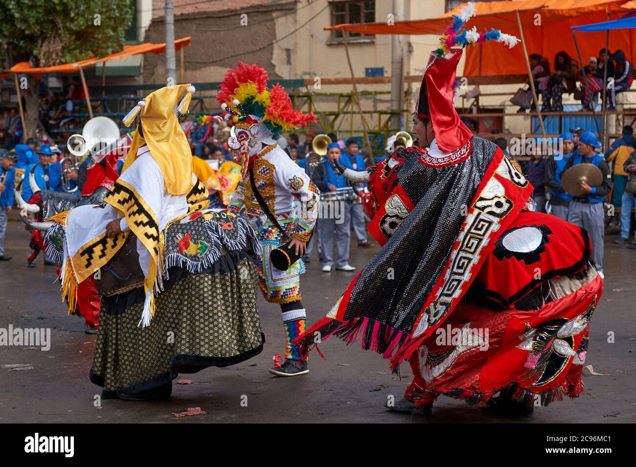 Members of a Waca Waca dance group in ornate costume parade through the ...