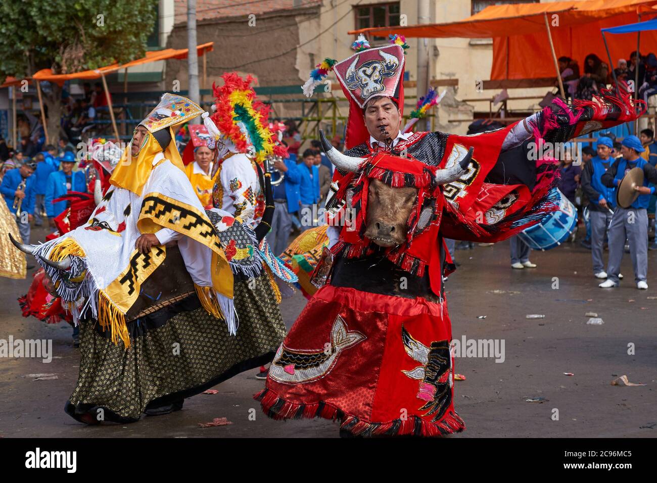 Members of a Waca Waca dance group in ornate costume parade through the ...