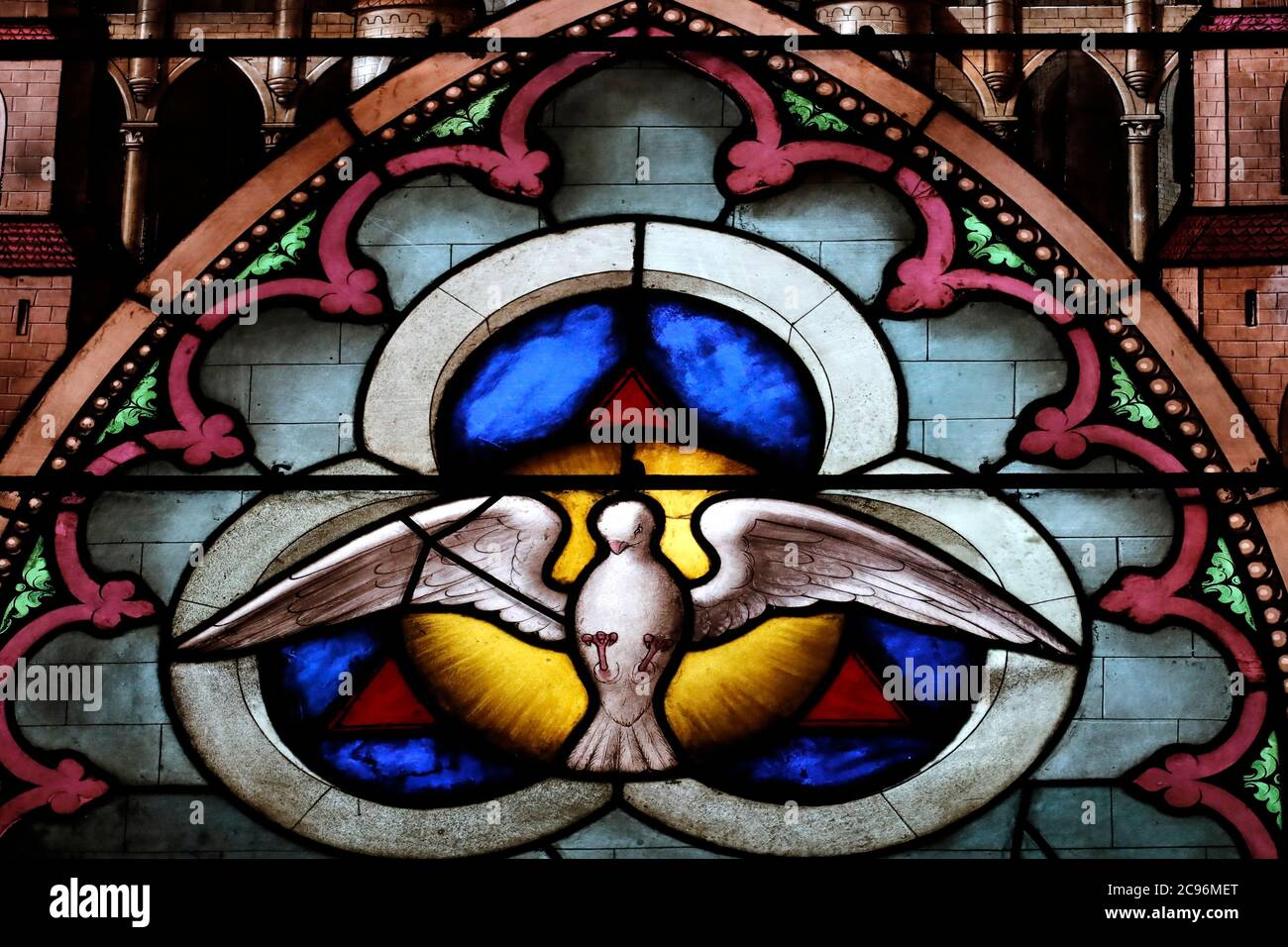 Basilica of Our Lady of Geneva. Stained glass window. Dove of Holy ...