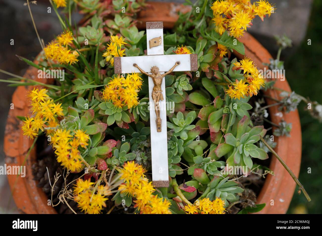 Crucifix and flowers in Eure, France Stock Photo - Alamy