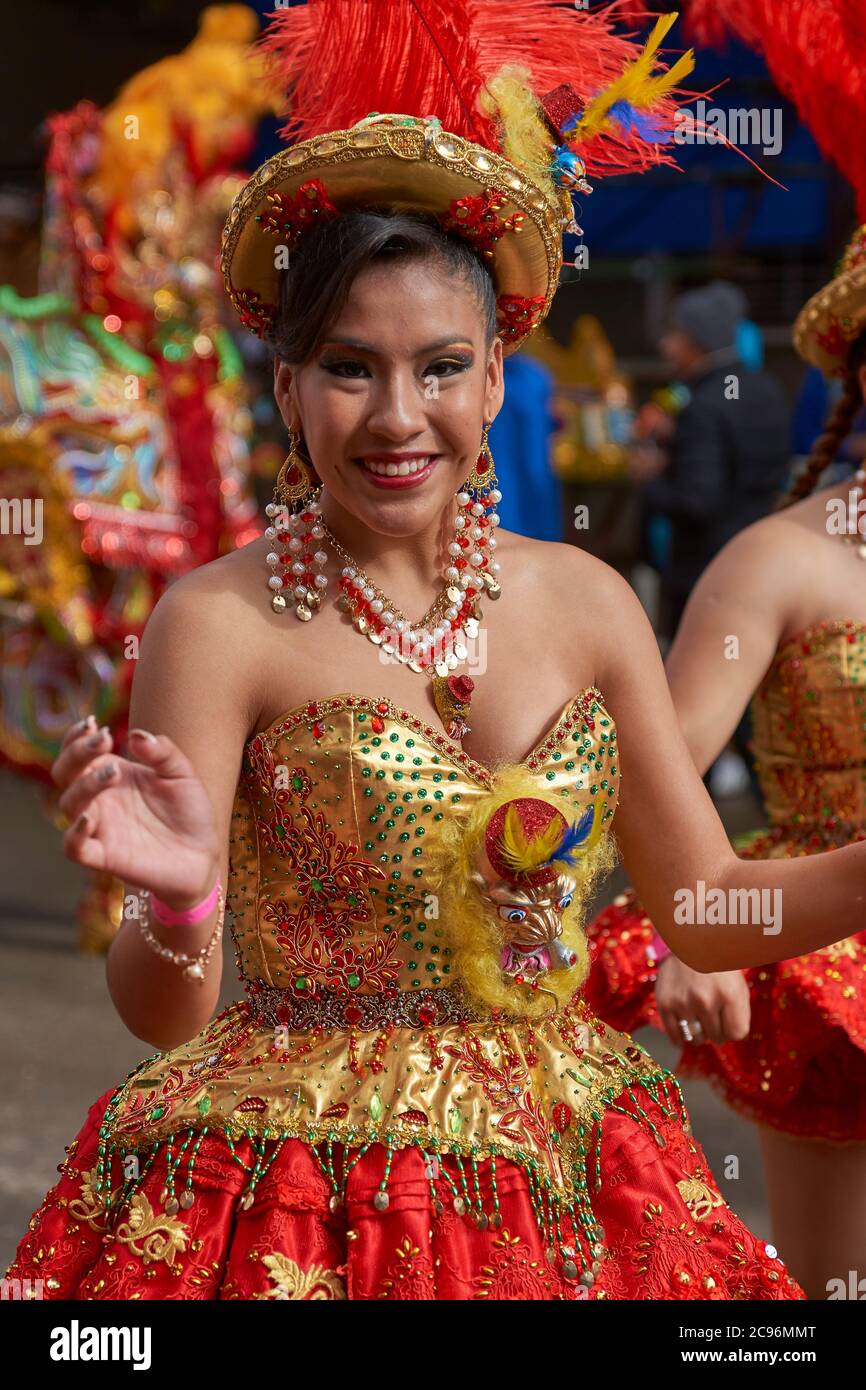 Morenada dancers in ornate costumes parade through the mining city of ...