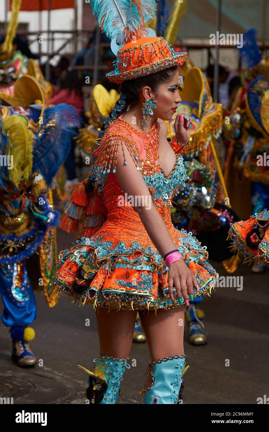 Morenada dancers in ornate costumes parade through the mining city of ...