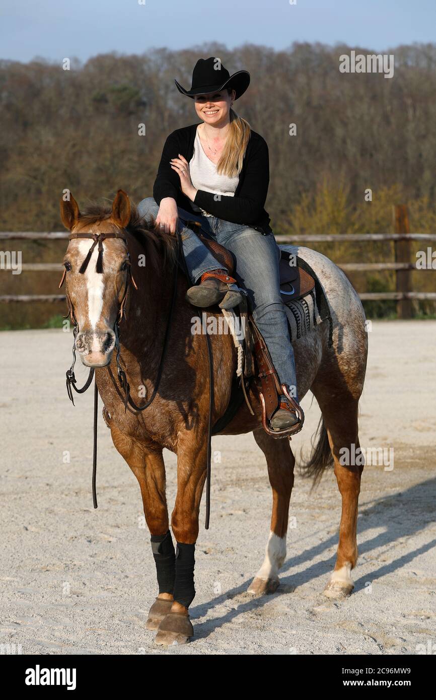Young woman riding a horse in a Normandy ranch, France Stock Photo - Alamy