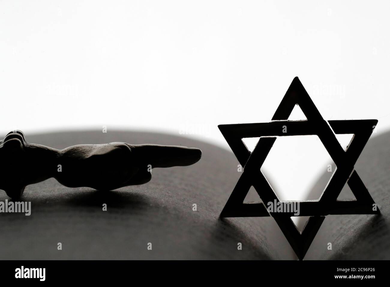 A silver Yad Jewish ritual pointer, a Jewish star or star of David and ...