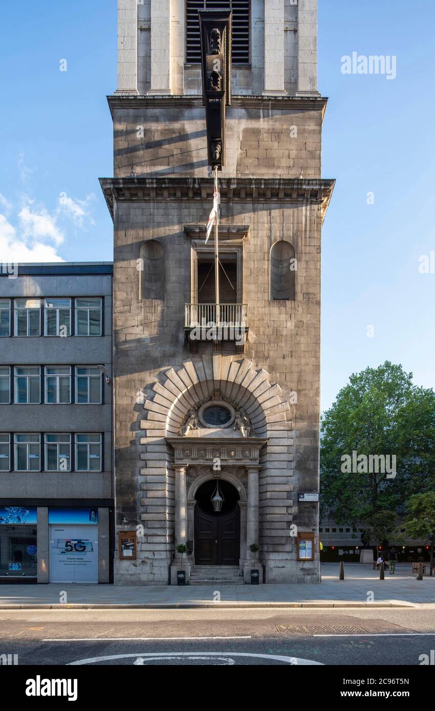 Axial detail view of base of tower, angels flank an oval window above a ...