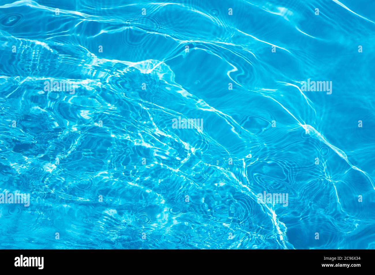 Closeup of rough water surface texture with splashes and bubbles in ...