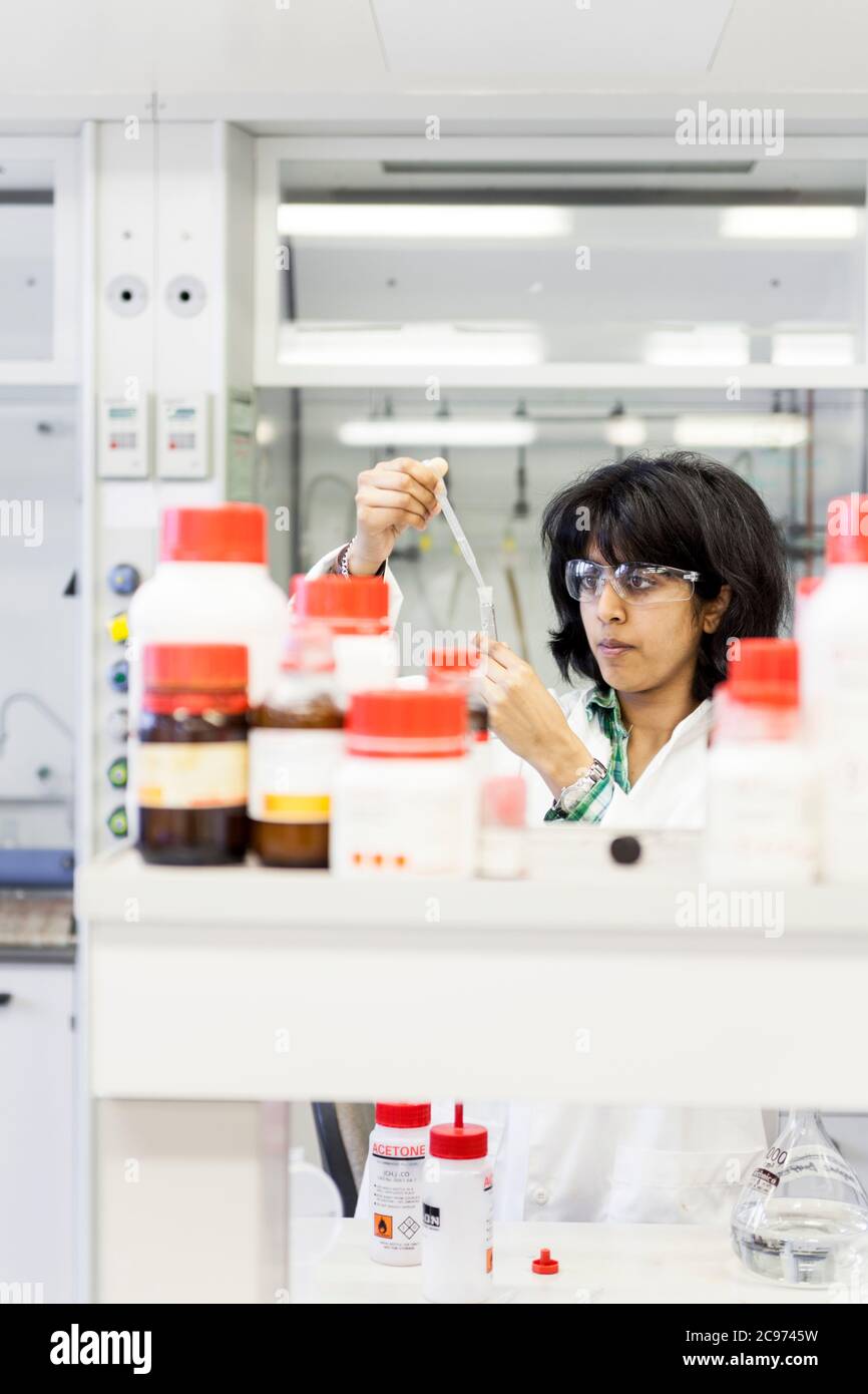 Female scientist research in laboratory Stock Photo - Alamy