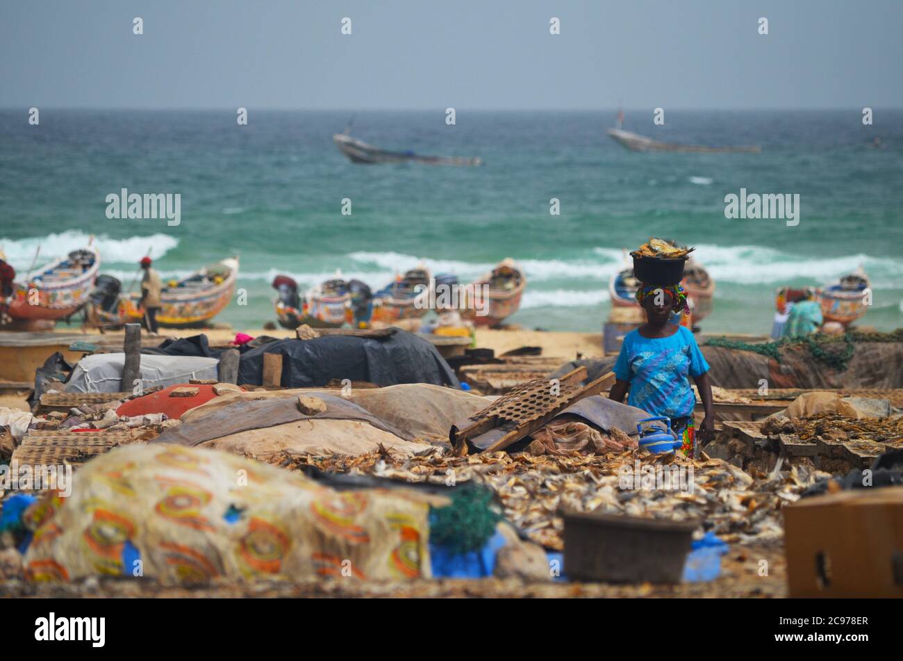 Artisanal fish processing site in Cayar, Senegal Stock Photo - Alamy
