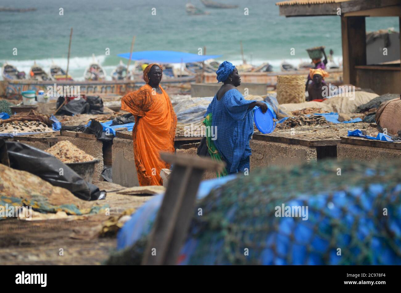 Artisanal fish processing site in Cayar, Senegal Stock Photo - Alamy