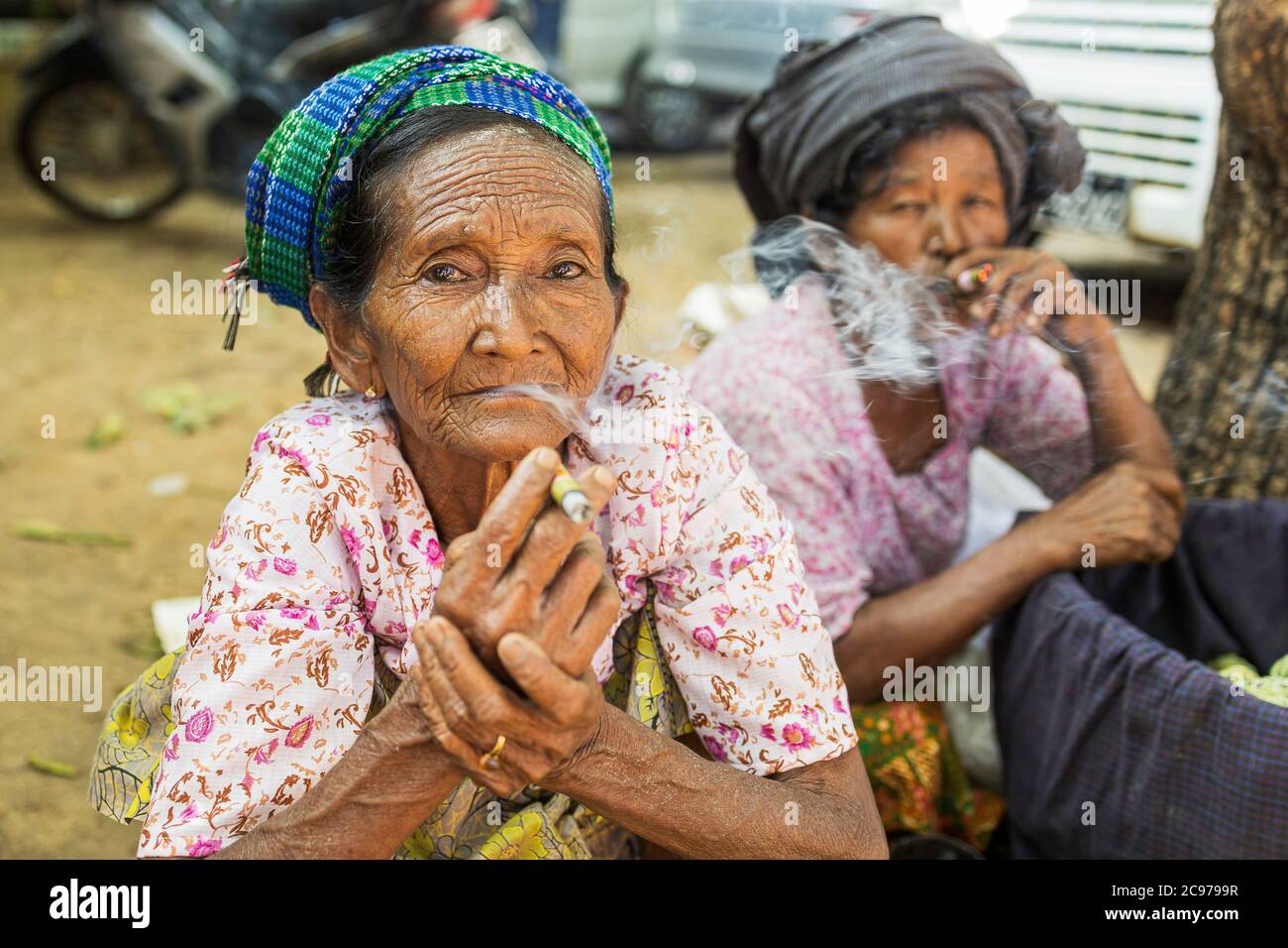 Bagan/Myanmar-October 5th 2019: Burmese elderly women are sitting and ...