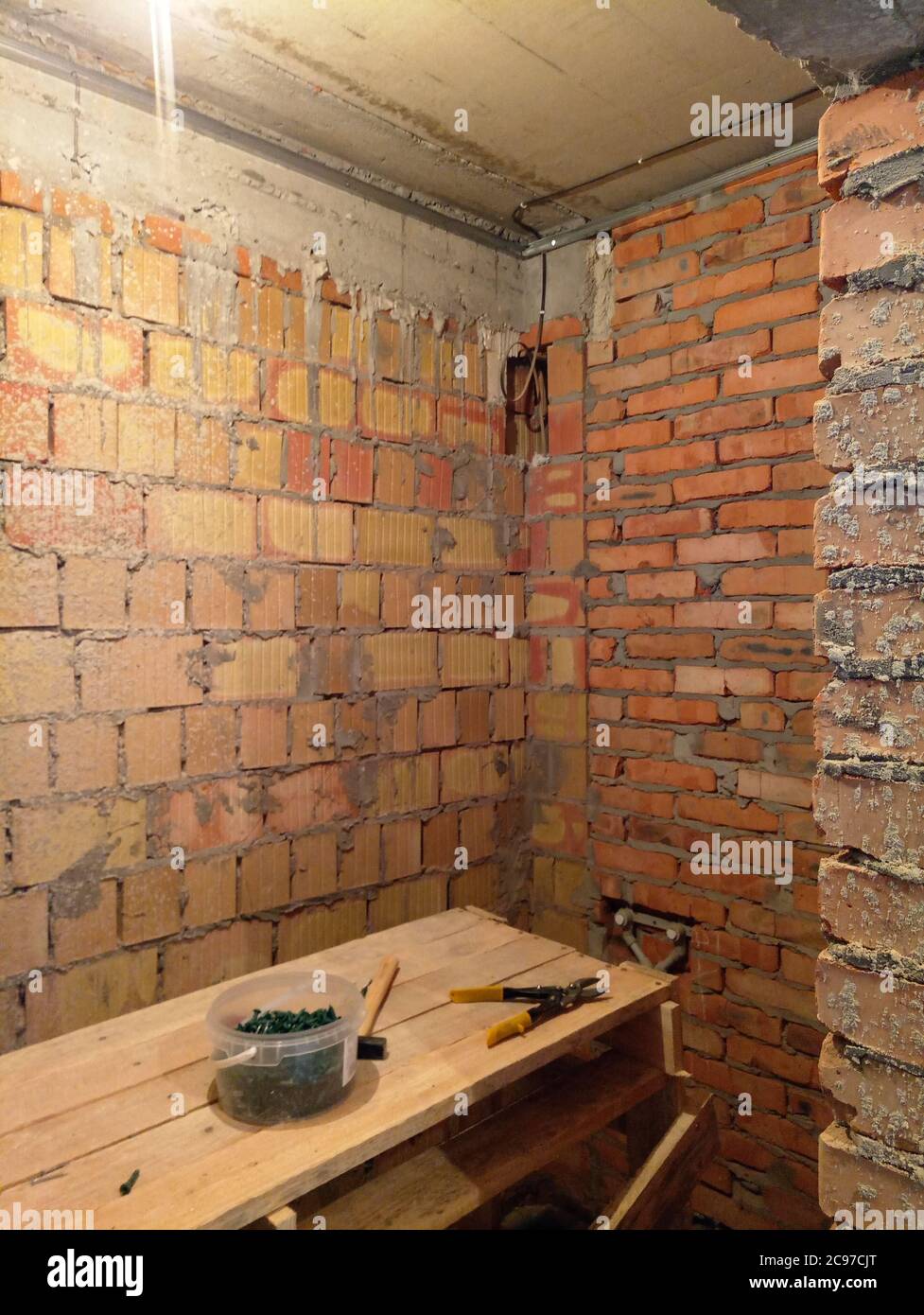 repair in a brick building at construction site Stock Photo - Alamy