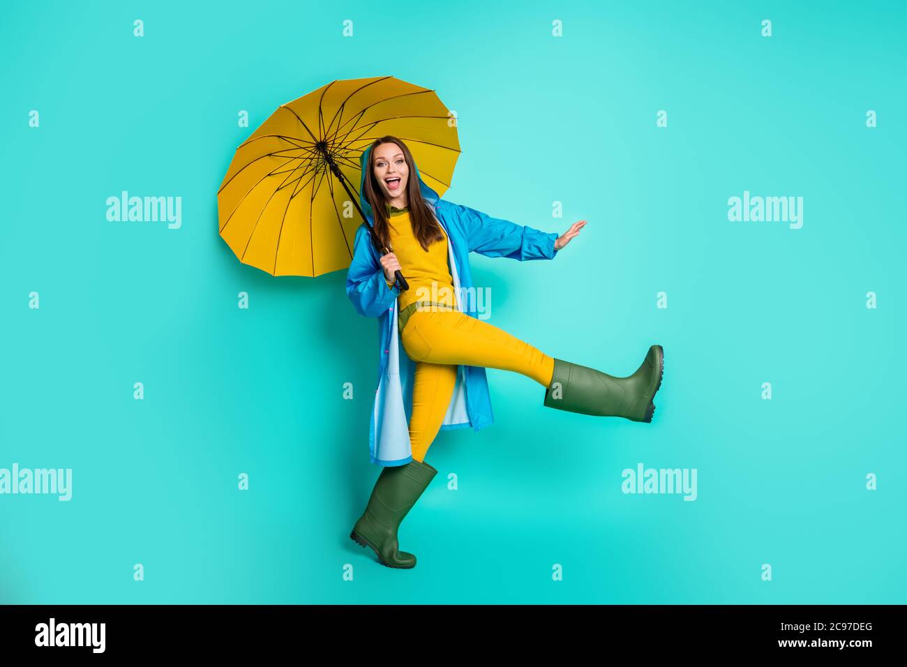 Full body profile photo of attractive lady good mood rainy weather walk ...