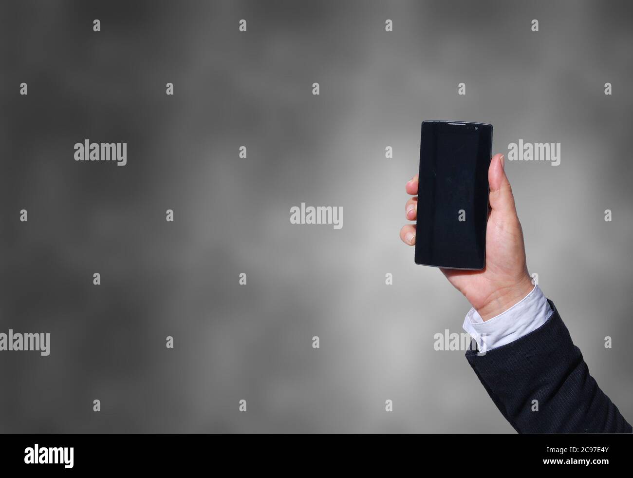 Smartphone in hand blank screen Stock Photo - Alamy