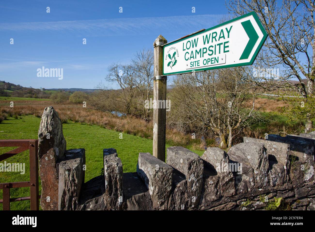 The west shore of lake Windermere in the Lake district with a sign to ...