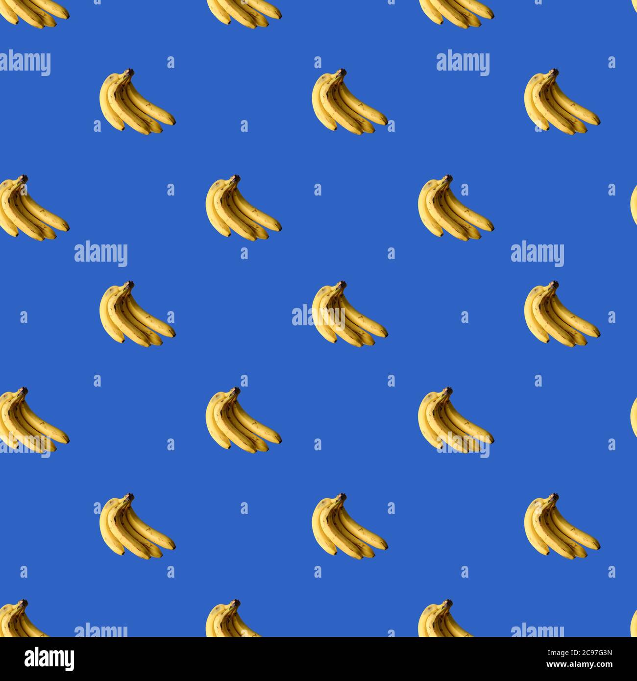 Seamless trendy blue background with ripe bananas. Tropical background ...
