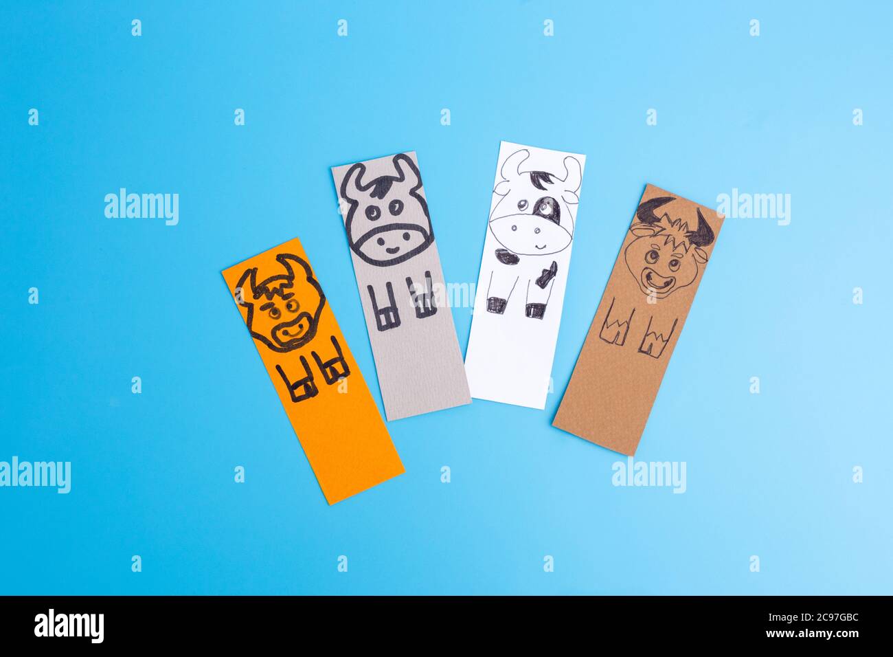 Bookmarks with bull or cow on blue background, handmade paper craft for ...