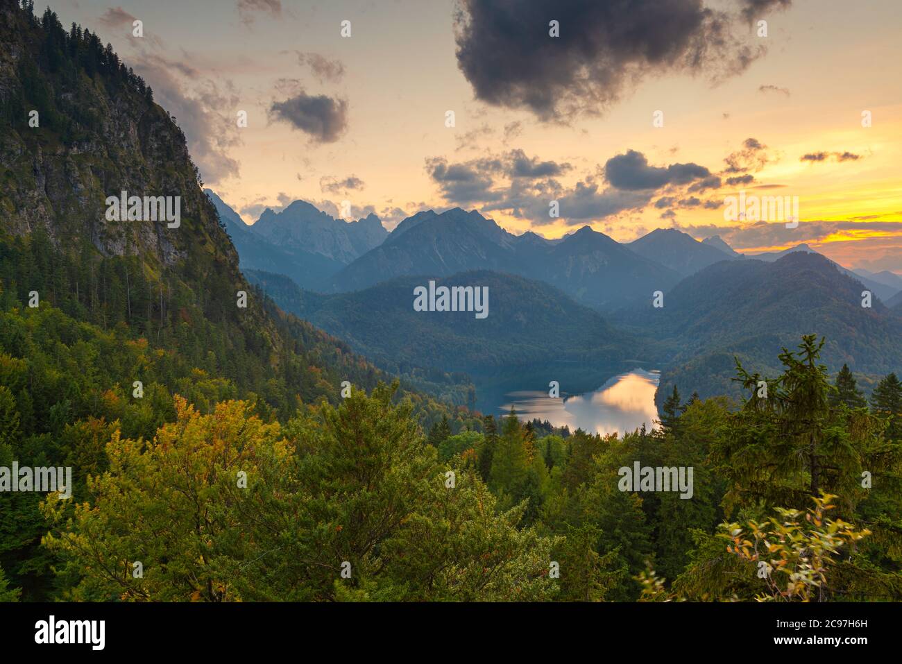 Bavarian Alps landscape in Fussen, Germany with Lake Alpsee at dusk ...