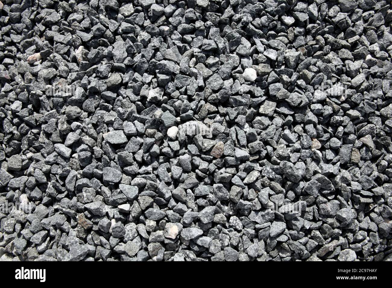 Background texture of grey black, crushed quarry rock pebble stones ...