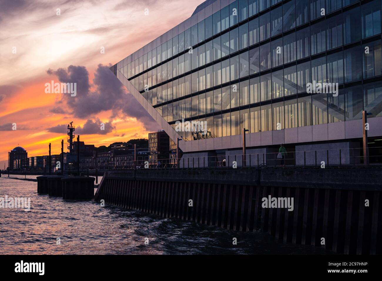 Dockland modern office building during sunset. In the harbour of ...