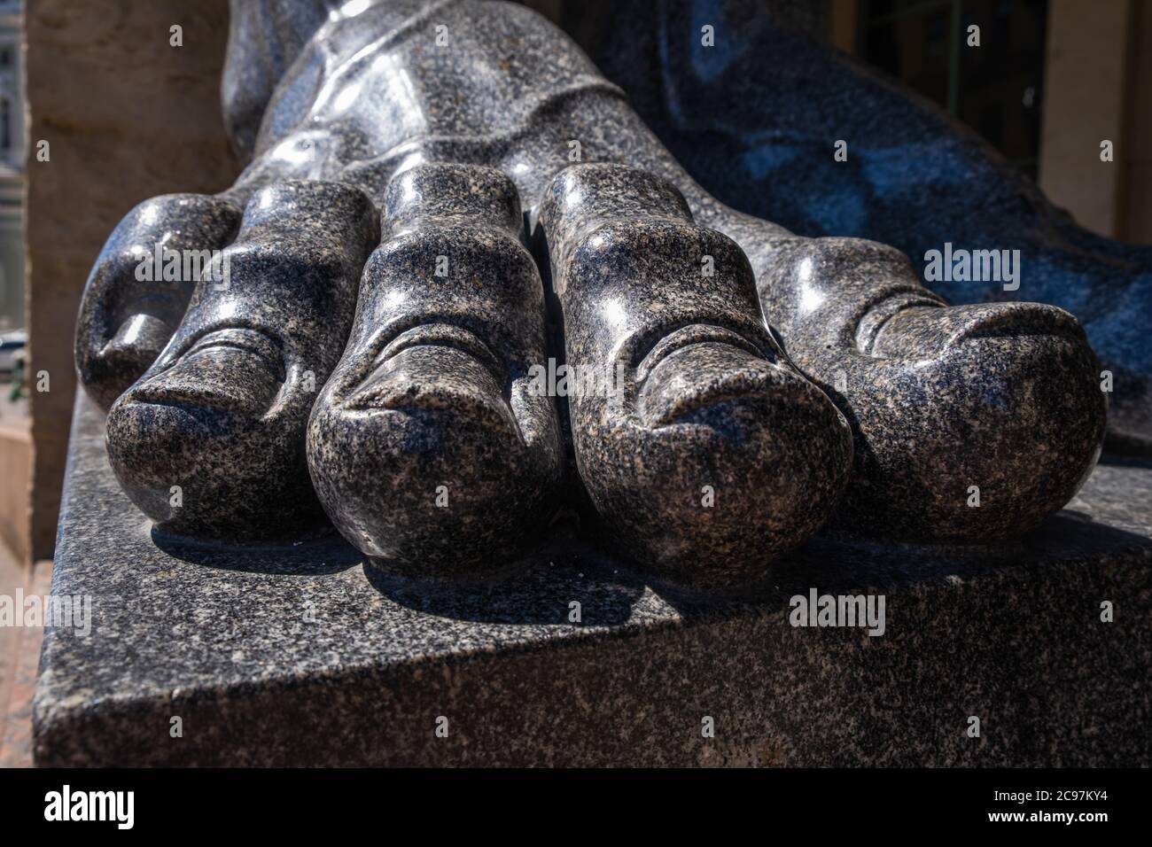 Toes of the Atlanta sculpture in the center of St. Petersburg, Russia ...