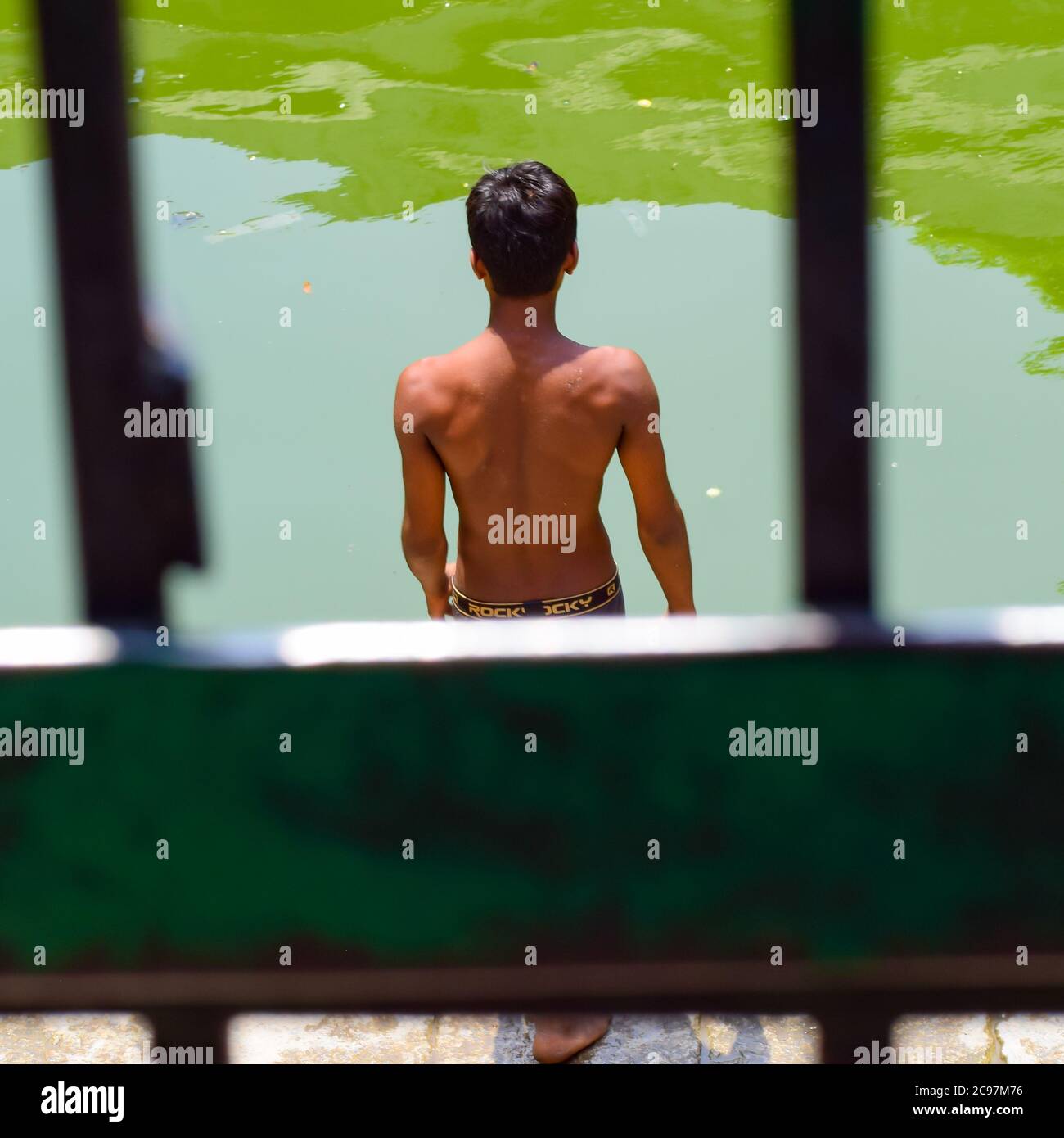 New Delhi India – March 13 2020 : Child taking holy bath Inside Hazrat ...