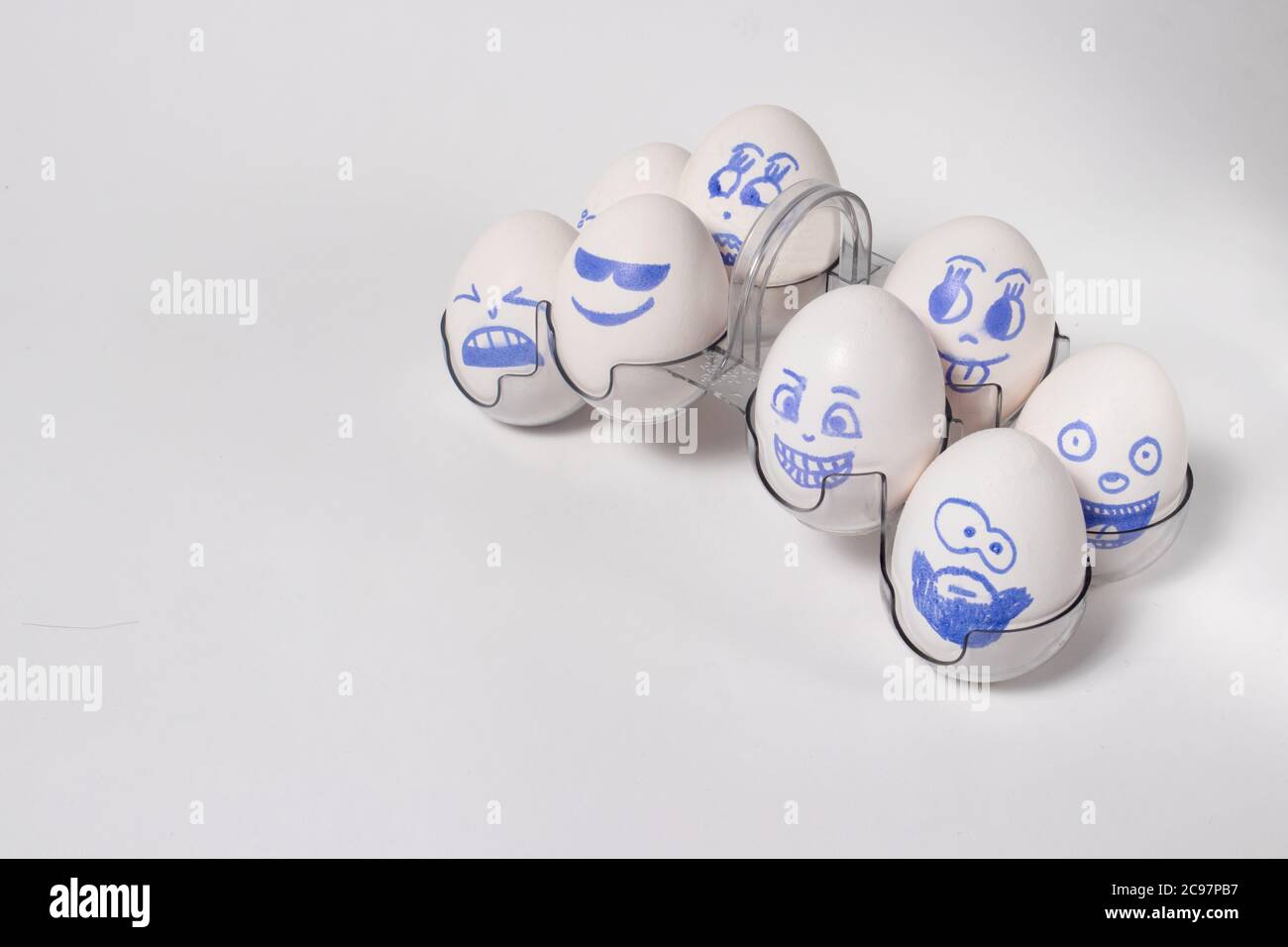 Funny chicken eggs. Smiley eggs with faces, funny faces. Eggs with ...
