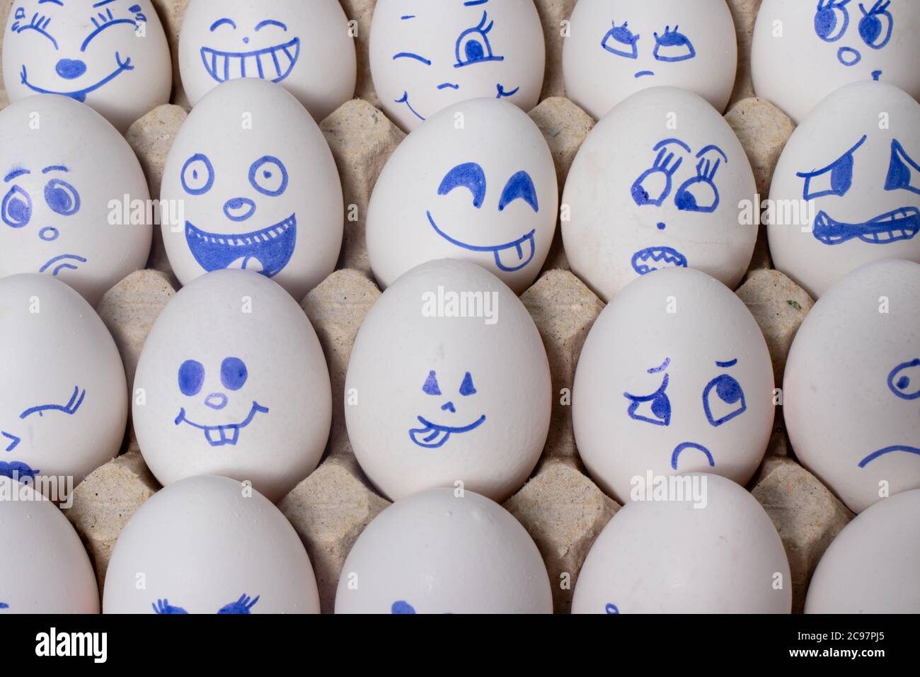 Funny chicken eggs. Smiley eggs with faces, funny faces. Eggs with ...