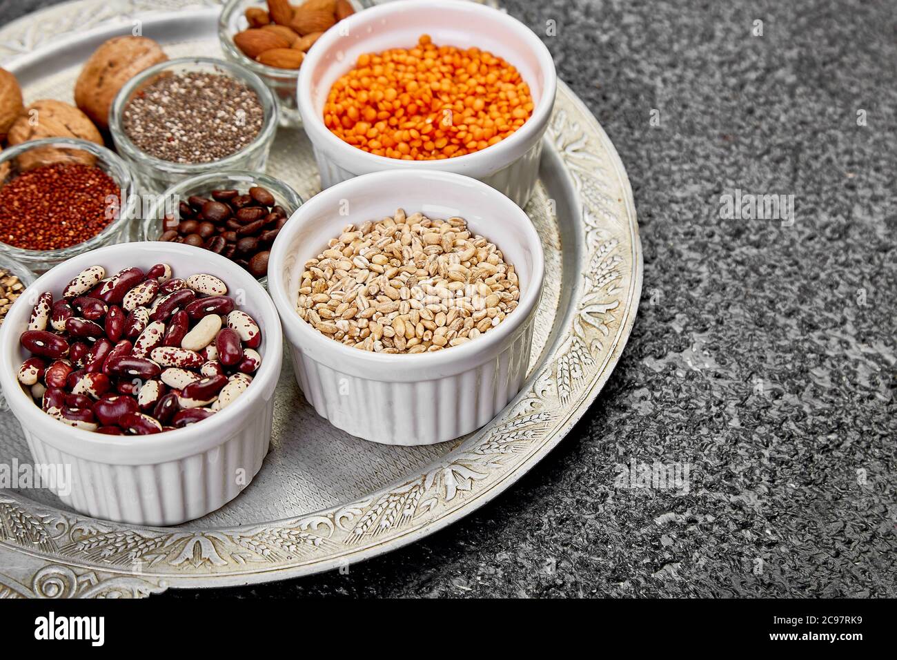 Beans and nuts selection in bowls. Healthy food Stock Photo - Alamy