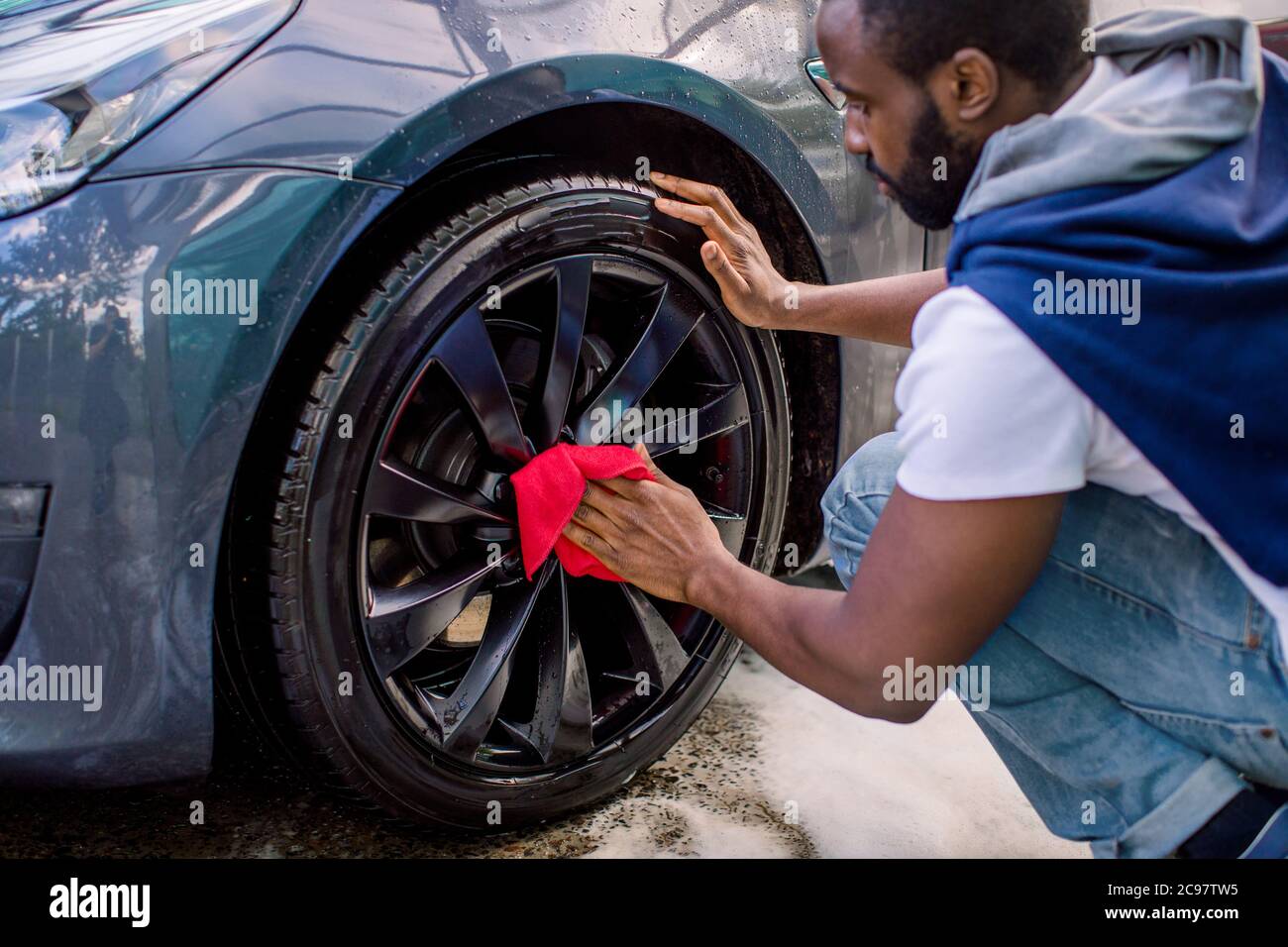 Car washing and detailing photo, car wash outdoors. Cropped image of ...