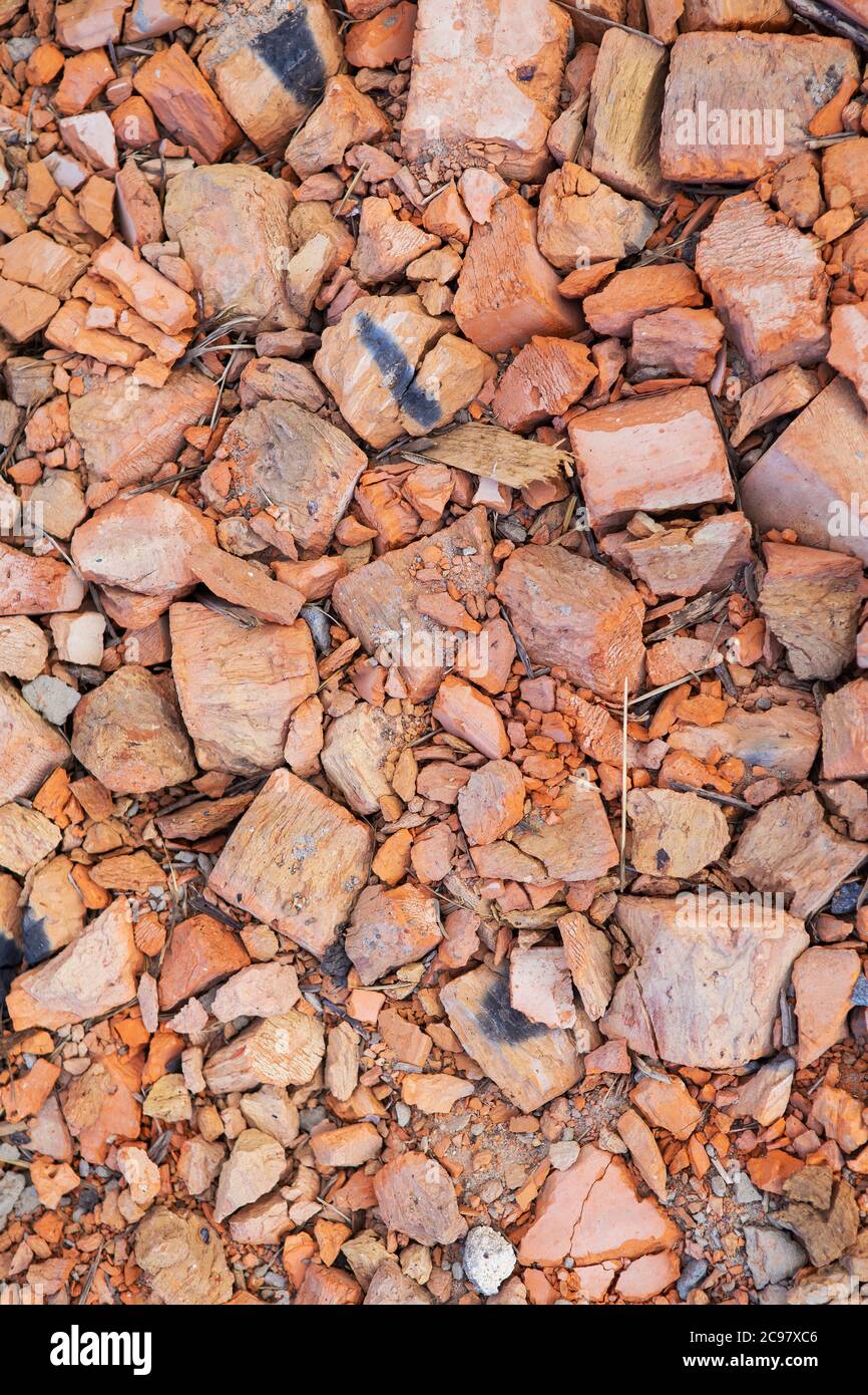 A pile of old broken red clay brick rubble after demolition of an old ...