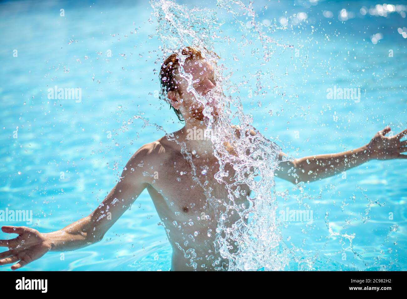 Muscular man pouring water hi-res stock photography and images - Alamy
