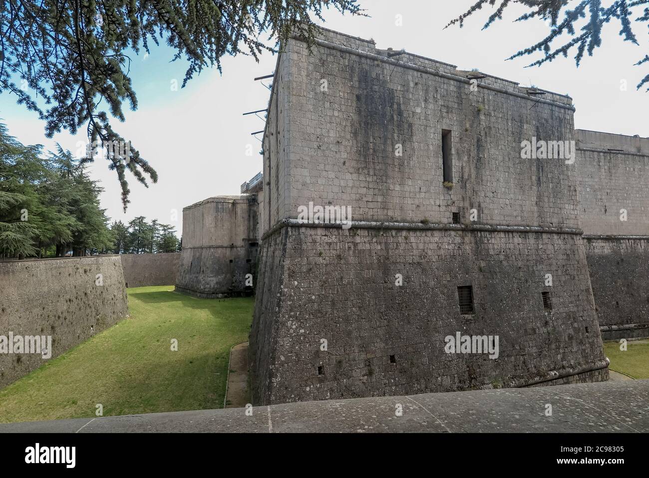 Wall and moat of the old Spanish Fort, dated 1534 in the city of Aquila ...