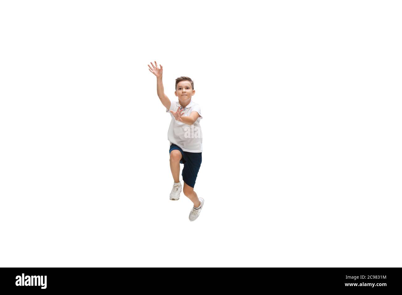 Happy kids, little and emotional caucasian boy jumping and running ...