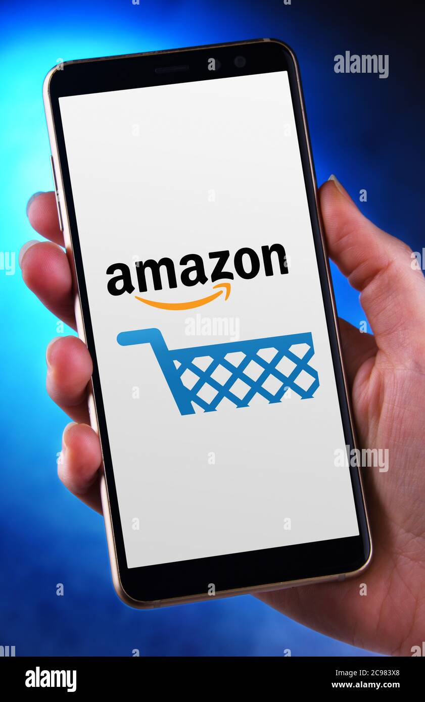 POZNAN, POL - JUN 20, 2020: Hands holding smartphone displaying logo of ...