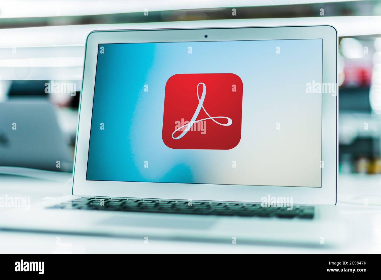 POZNAN, POL - JUN 16, 2020: Laptop computer displaying logo of Adobe ...