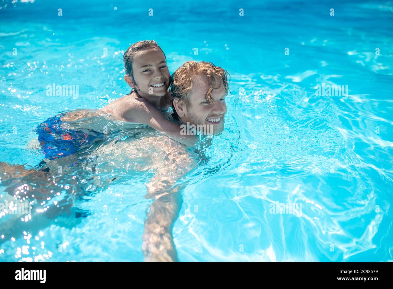 Child floating on back hi-res stock photography and images - Alamy