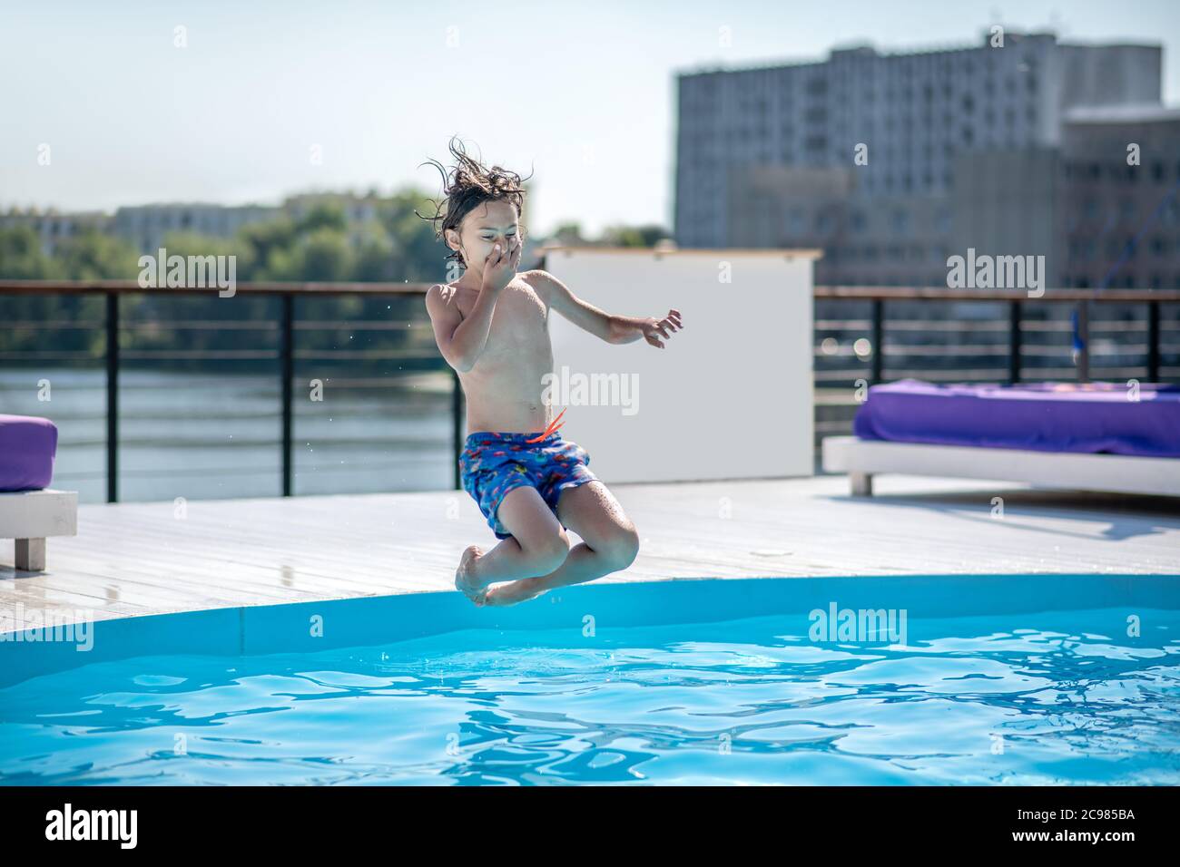 Boy falling water hi-res stock photography and images - Alamy