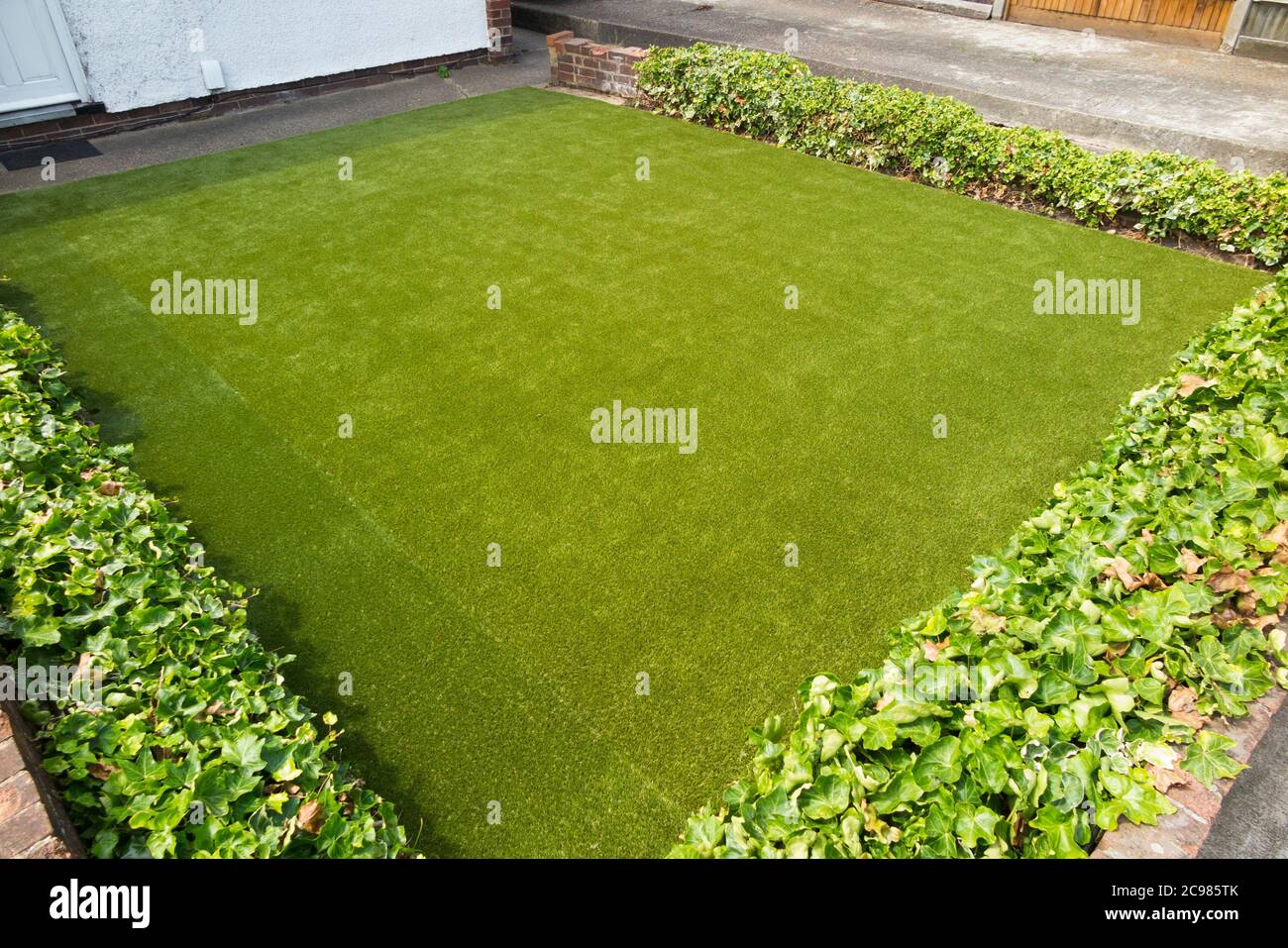 Artificial grass / newly laid astroturf perfect lawn in the front ...