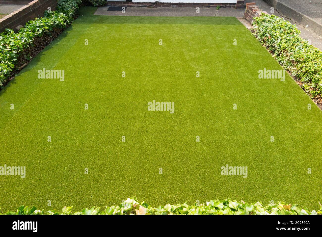 Artificial grass / newly laid astroturf perfect lawn in the front ...