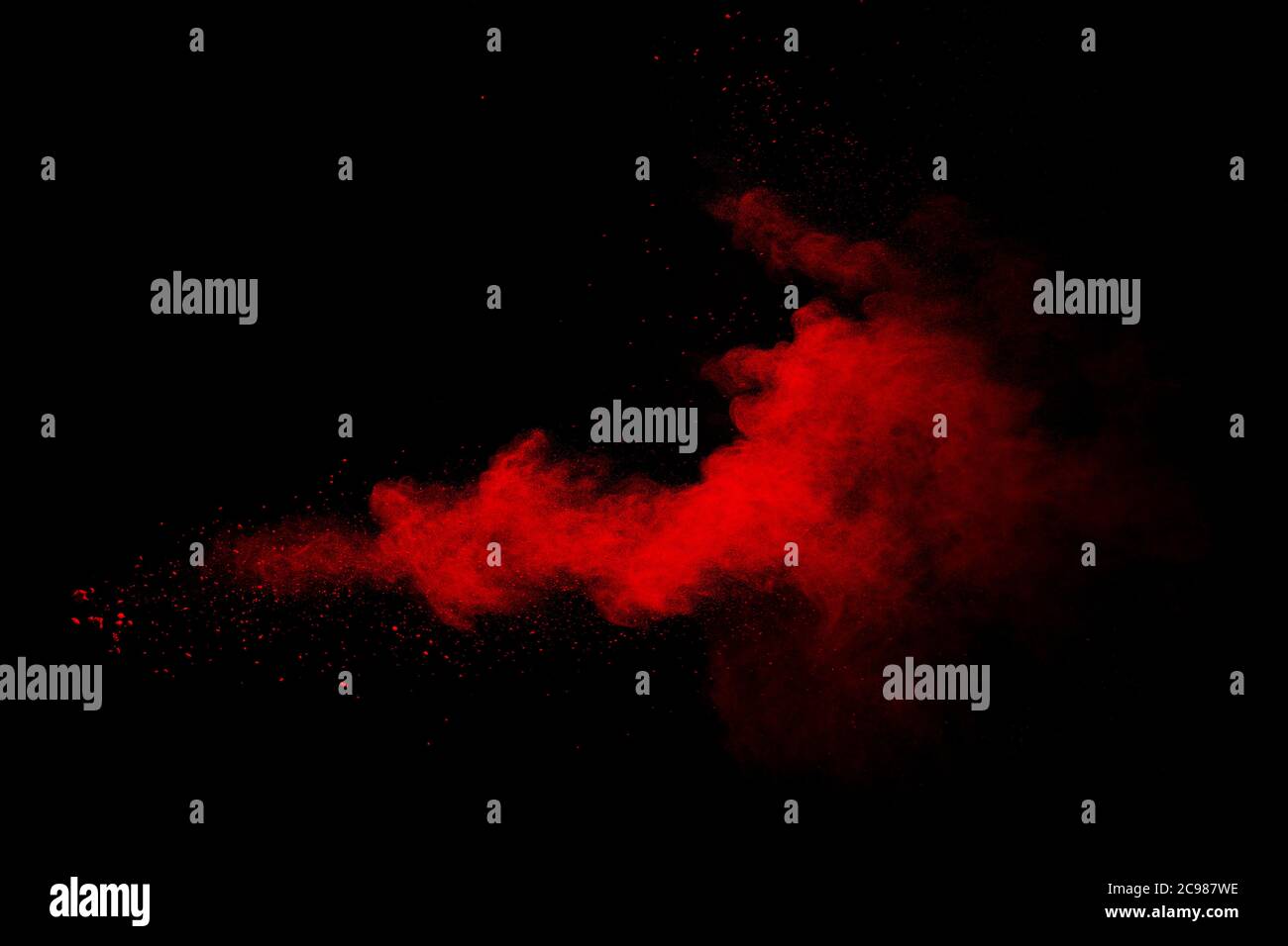 Abstract red powder on black background. Red color clouds Stock Photo ...