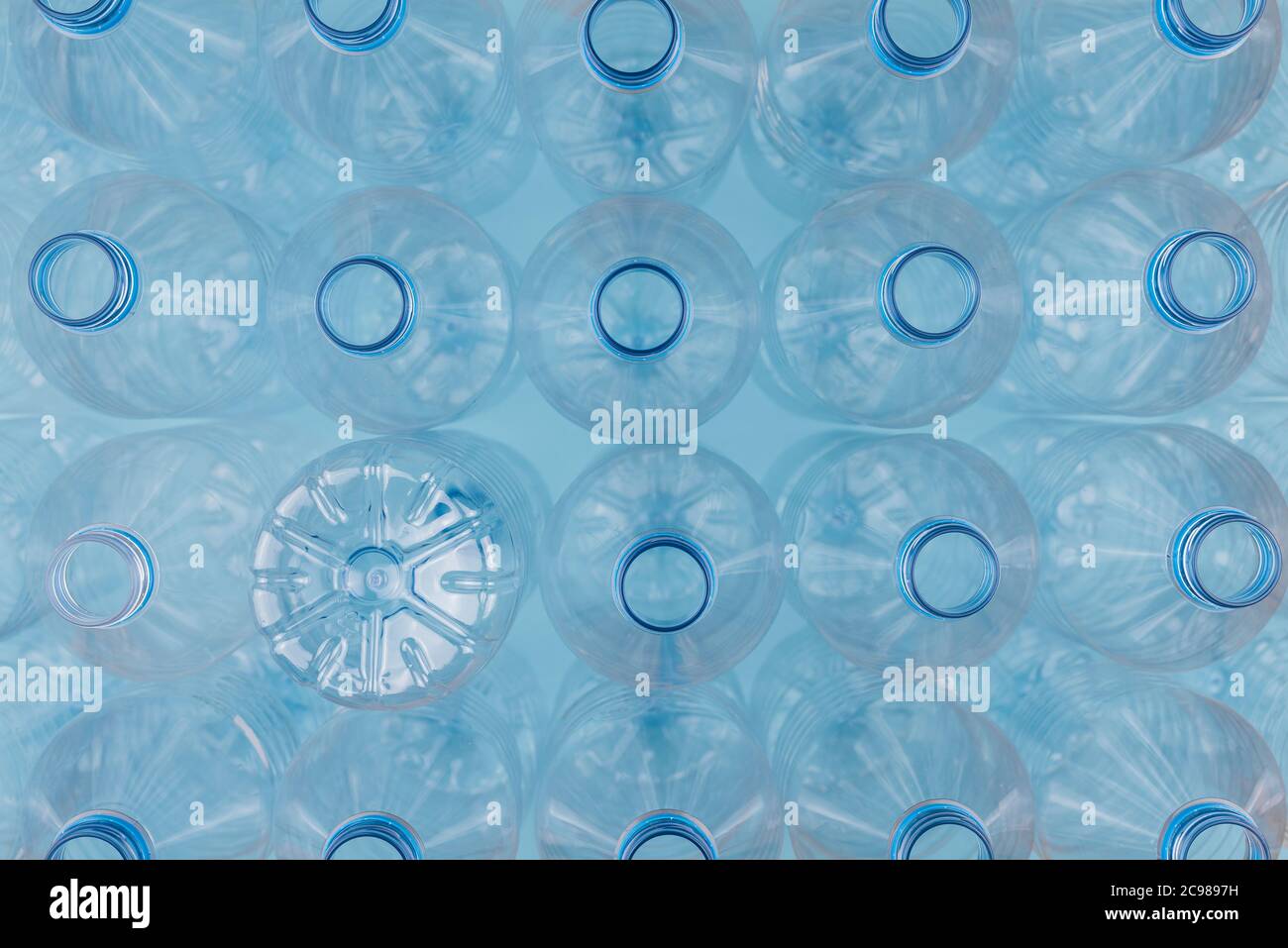 Horizontal color image with an overhead view of an empty clear plastic ...