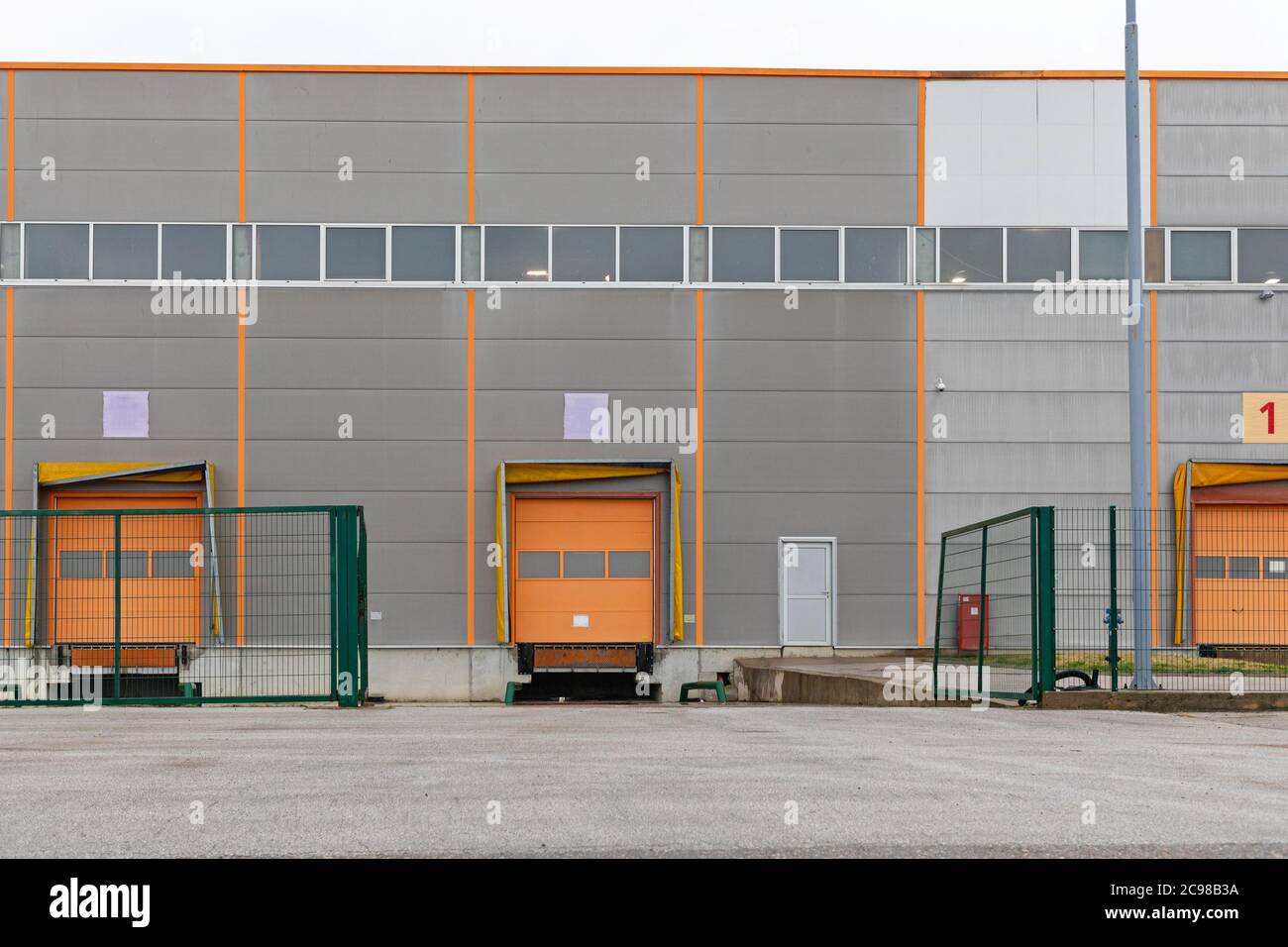 Loading Cargo Dock Doors at Distribution Warehouse Stock Photo - Alamy