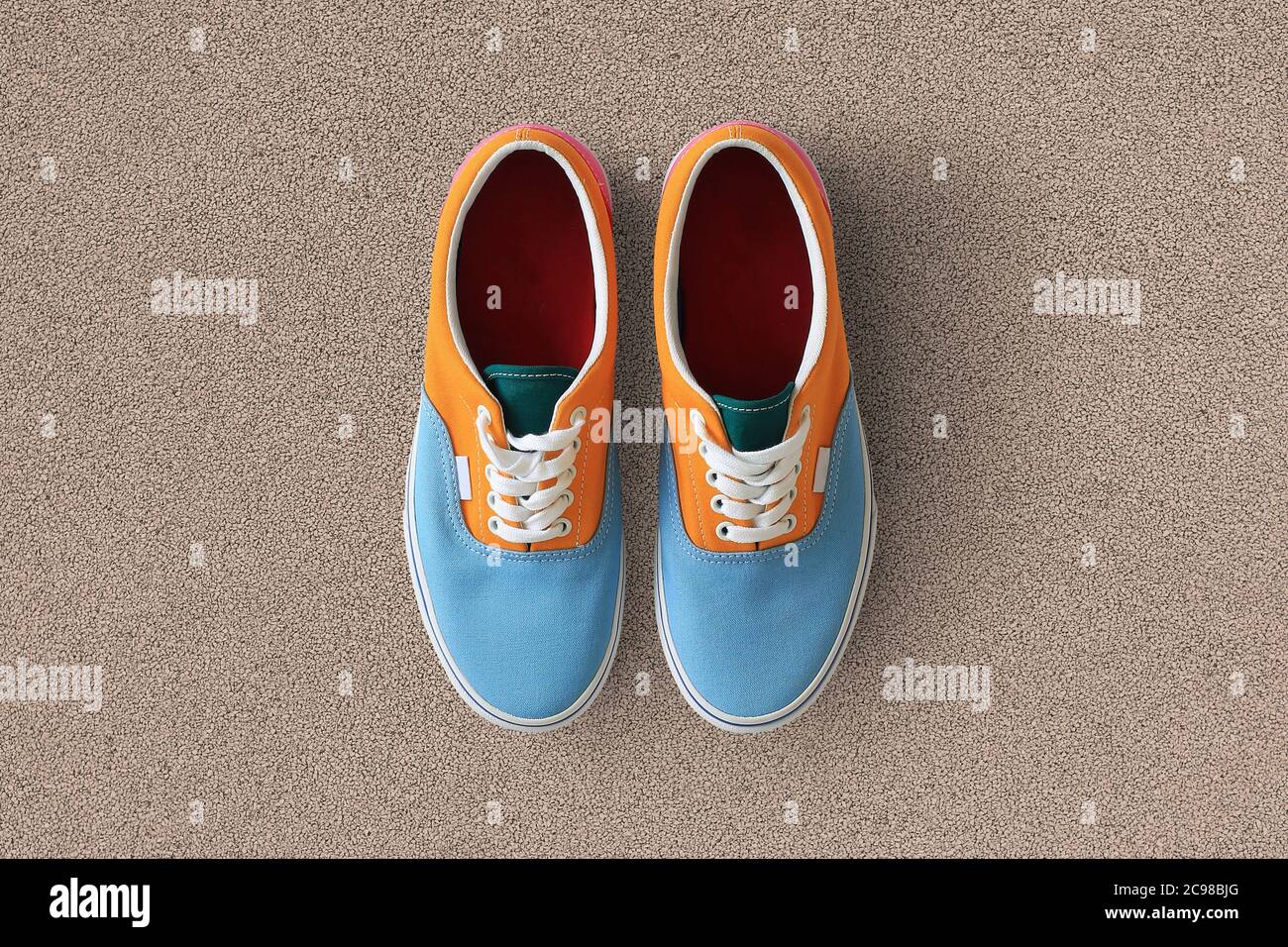 Color men sport sneakers on a white background Stock Photo - Alamy