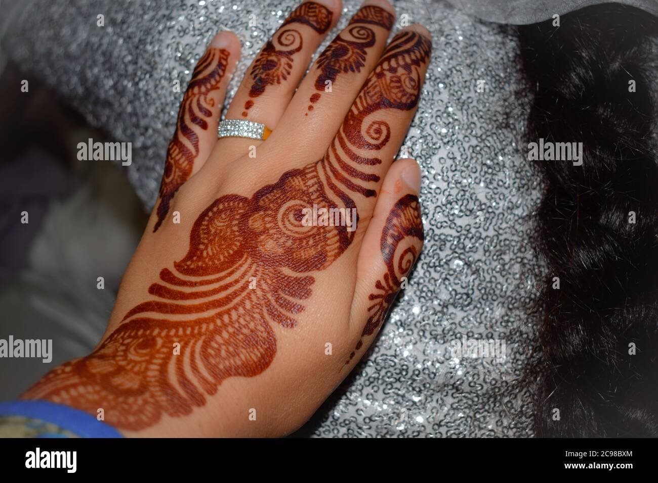 Hand designed with henna and showing beautiful hands Stock Photo - Alamy