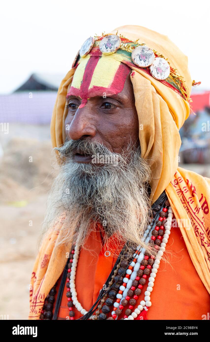 Portrait of an Indian Sadhu Baba (Monk) in traditional Saffron clothes ...