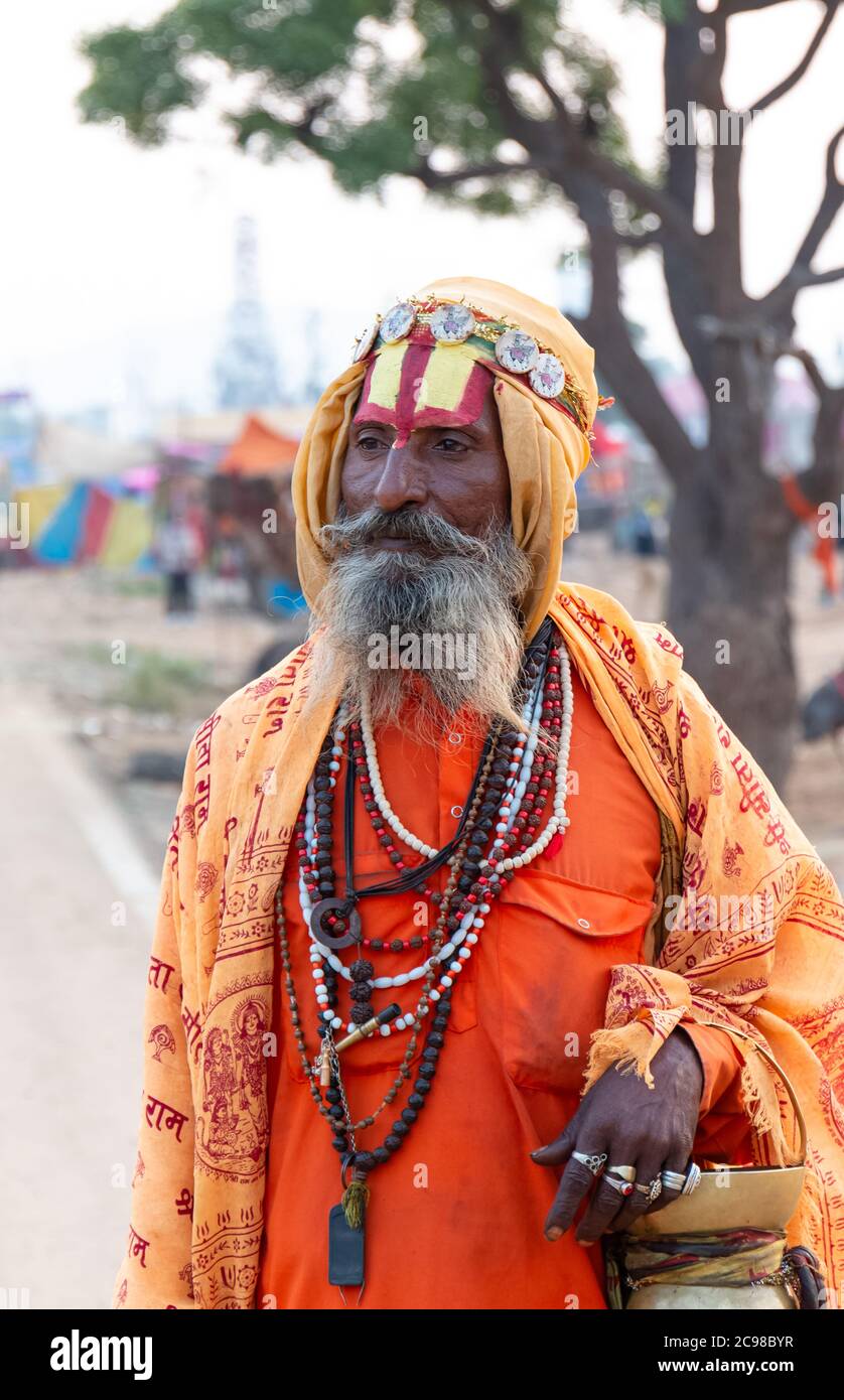 Portrait of an Indian Sadhu Baba (Monk) in traditional Saffron clothes ...