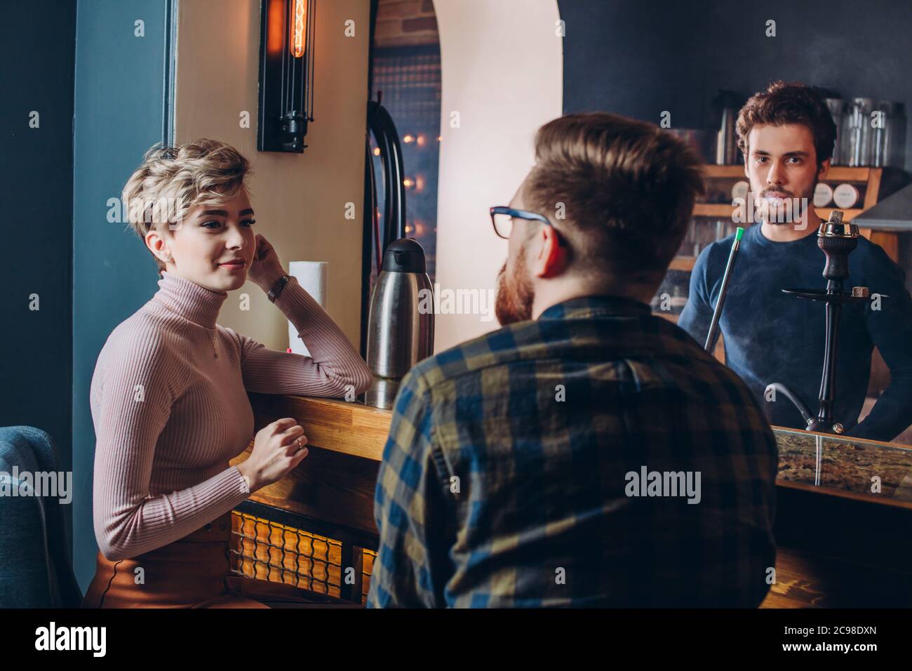 Couple talking to each other party hi-res stock photography and images ...